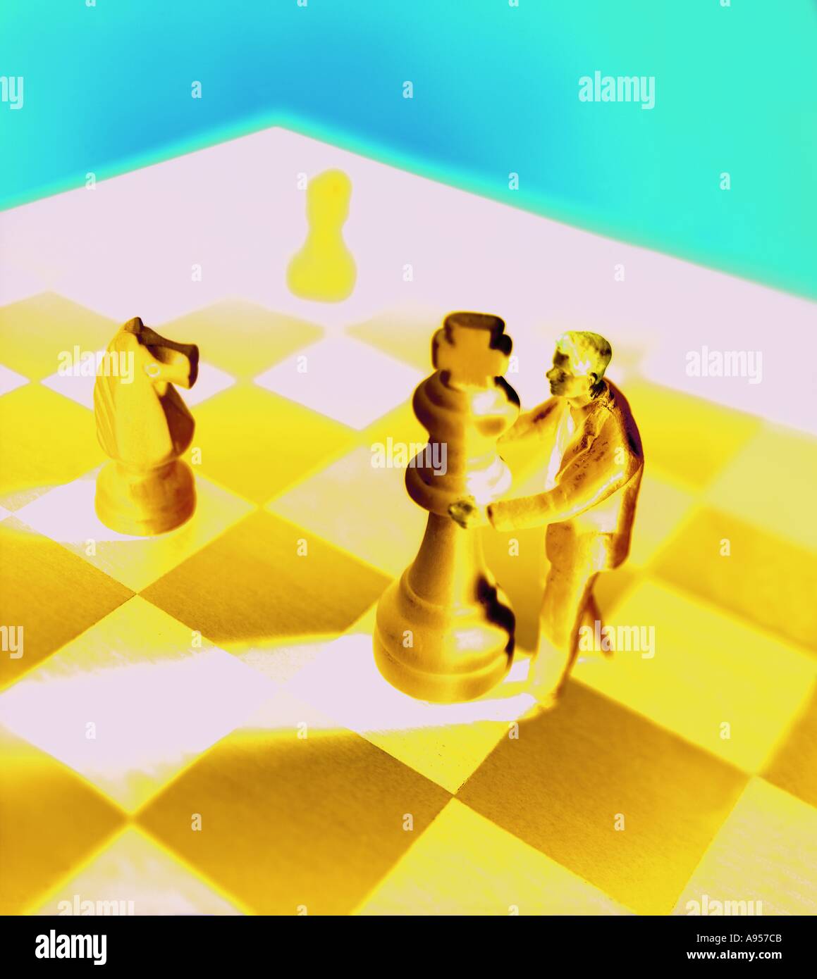 Photograph of person on chess board Stock Photo - Alamy