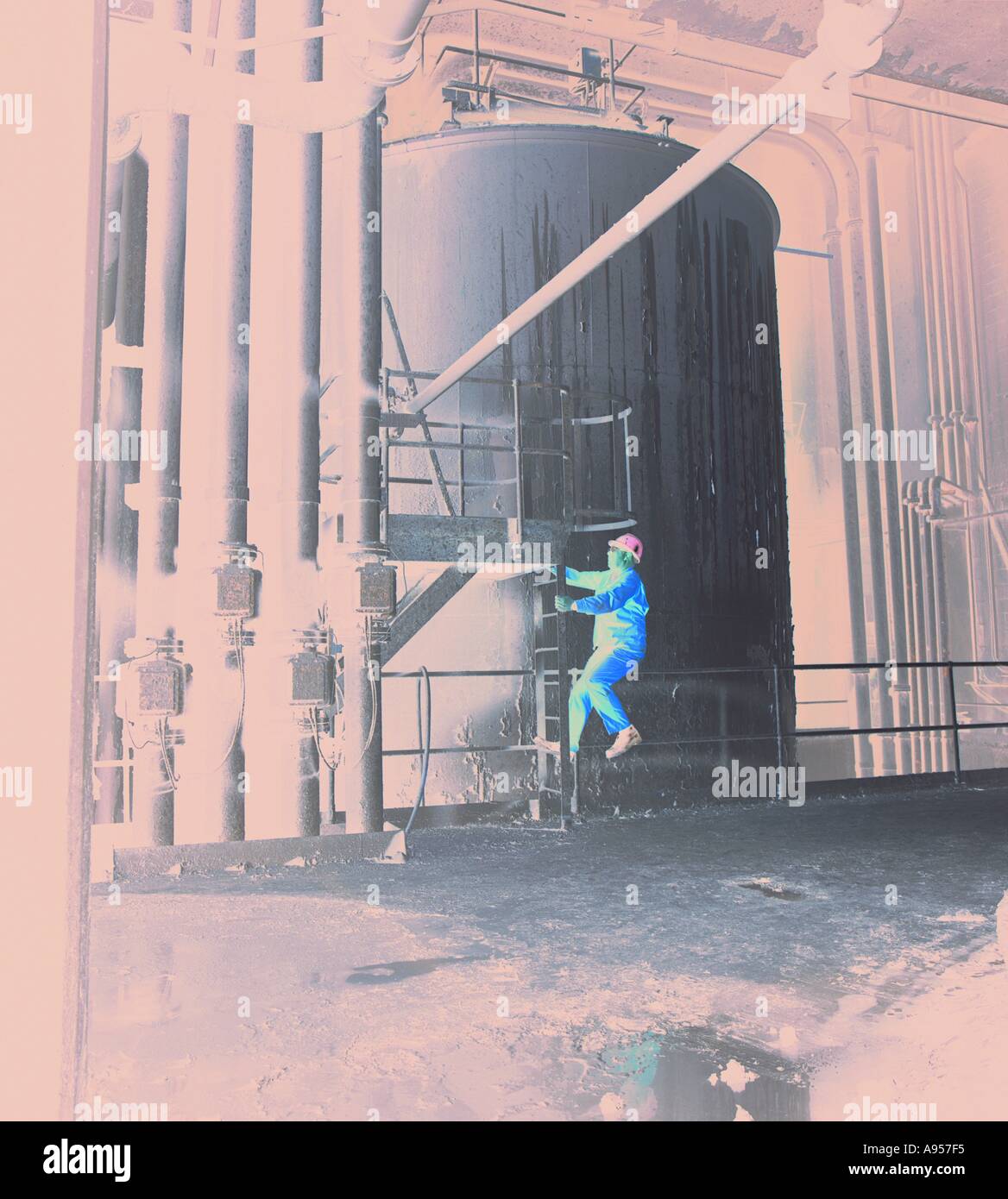 Photograph of man working in industrial plant Stock Photo - Alamy