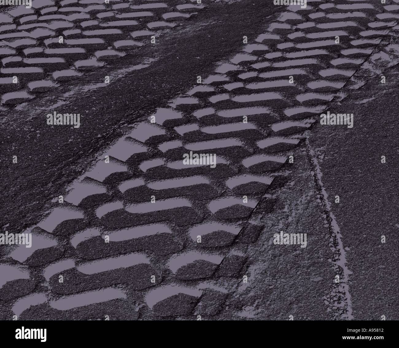 Photograph of large construction vehicle tyre tracks in soil Stock ...