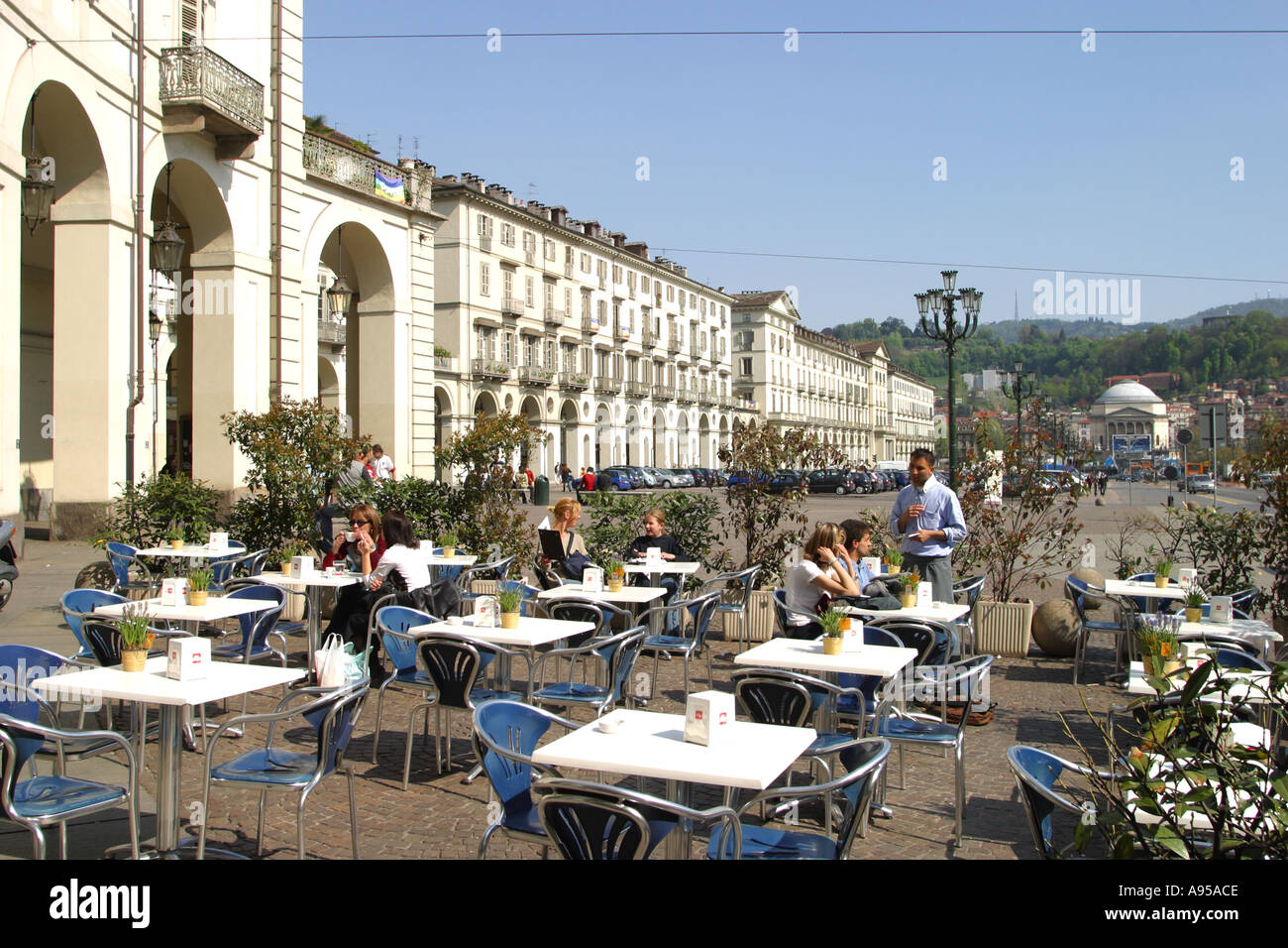 Outdoor cafe and piazza in Turin Stock Photo - Alamy