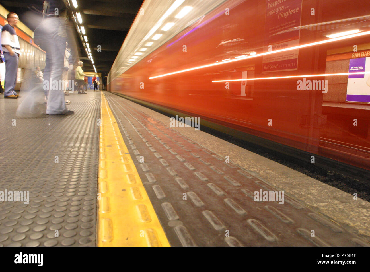 Moving metro train arriving in one of Milan underground stations Milan ...