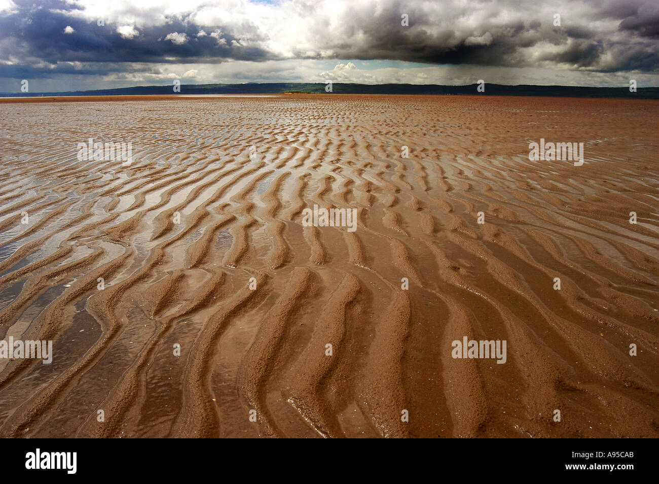 Sand ripples created by tide The Wirral Uk Stock Photo - Alamy