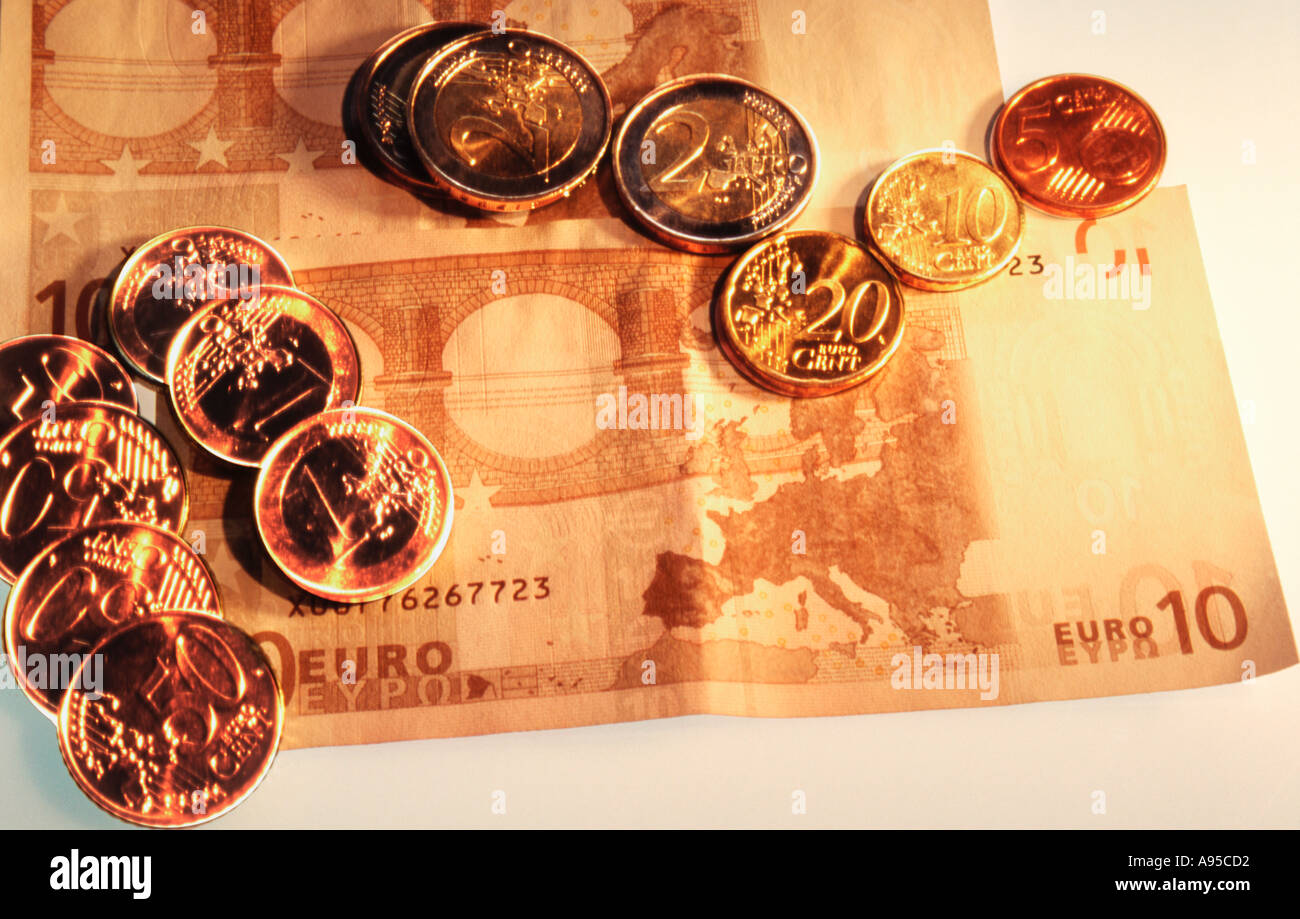 Euro notes and coins Stock Photo - Alamy