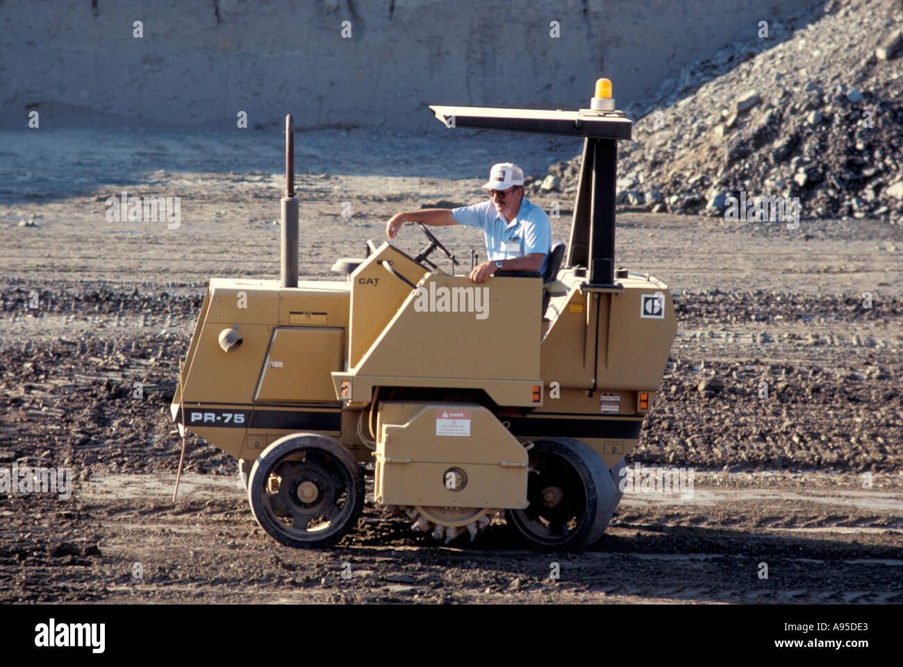 Caterpillar road paving equipment Stock Photo - Alamy