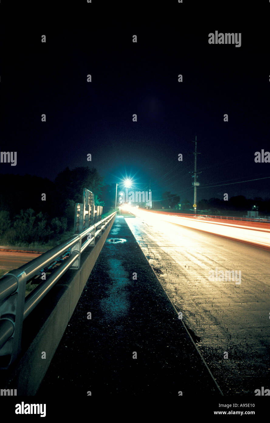 Highway interstate bridge and night traffic Stock Photo - Alamy