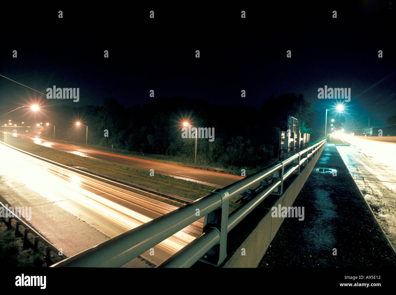 Highway interstate bridge and night traffic Stock Photo - Alamy