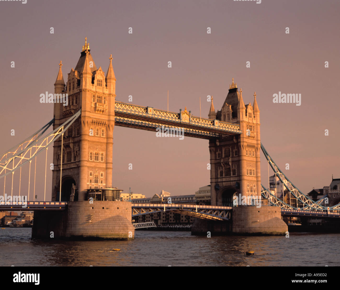 Tower Bridge over River Thames at sunset, London, England, UK Stock ...