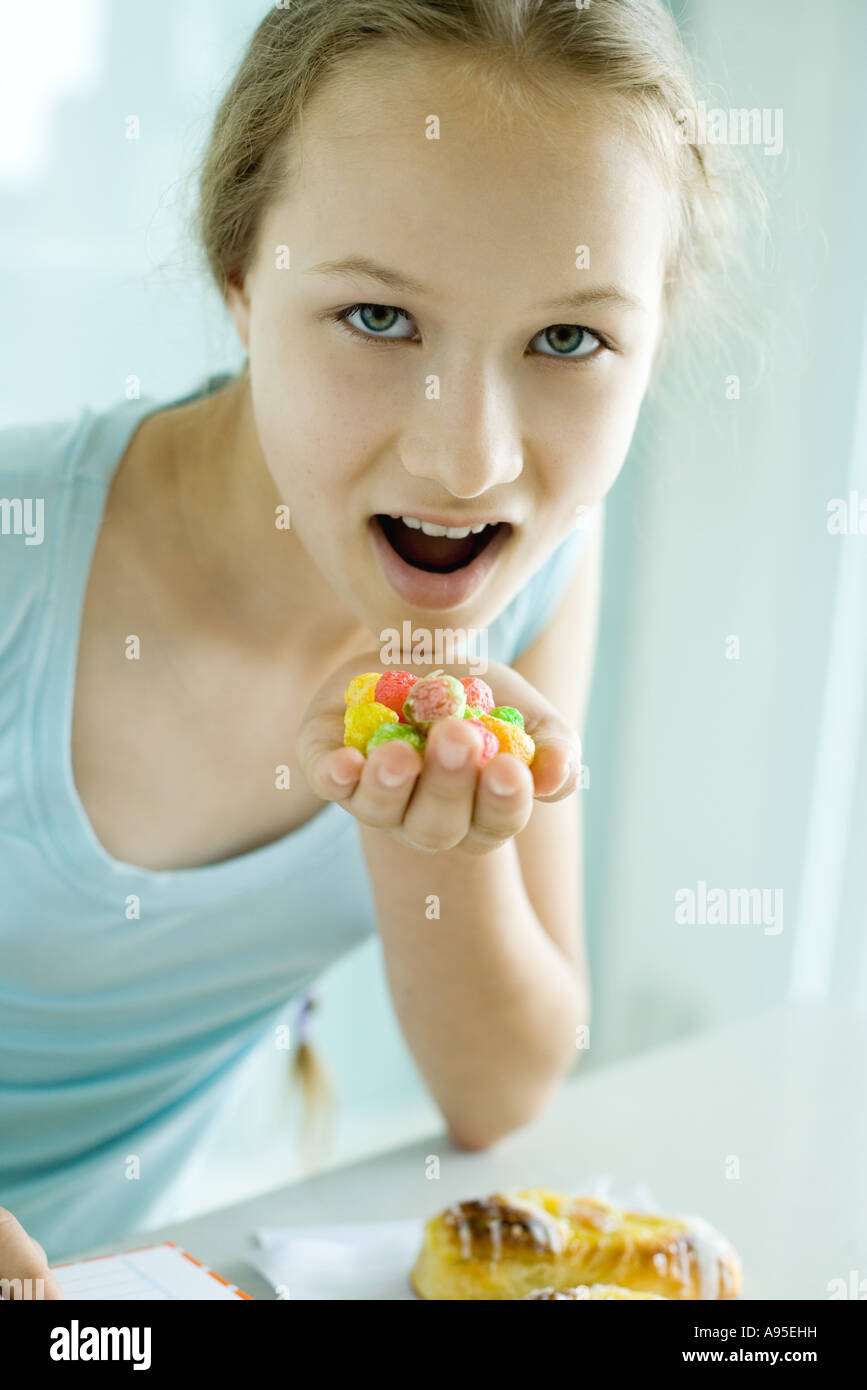 Girl eating junk food Stock Photo - Alamy