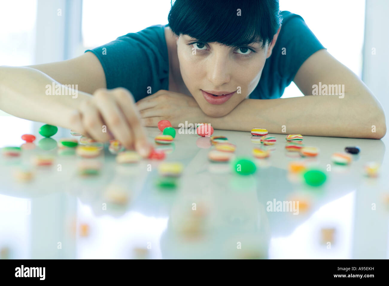 Woman slumped on table hi-res stock photography and images - Alamy