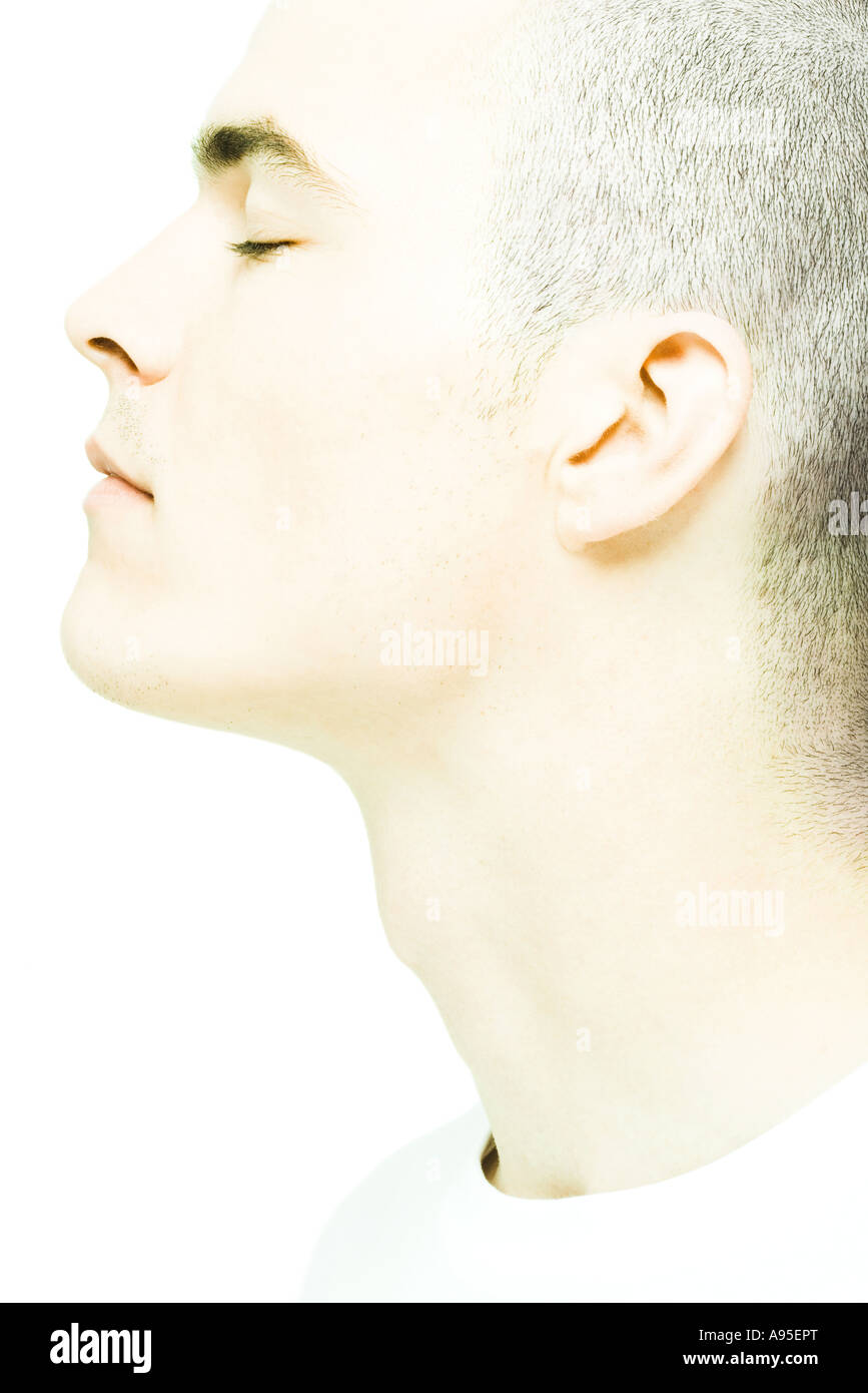 Young man with eyes closed, close-up of face and neck, profile Stock ...