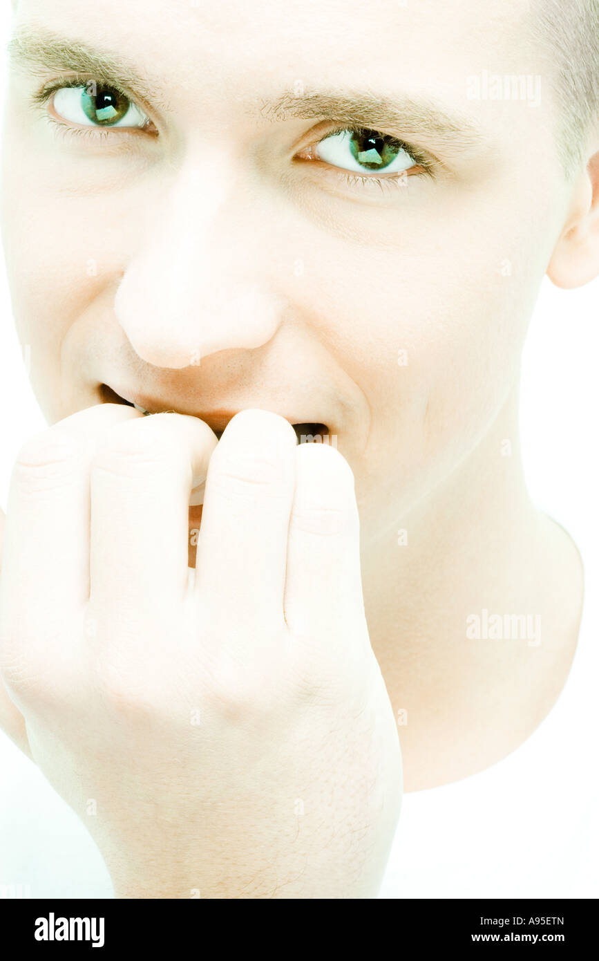 Man biting nails close hi-res stock photography and images - Alamy