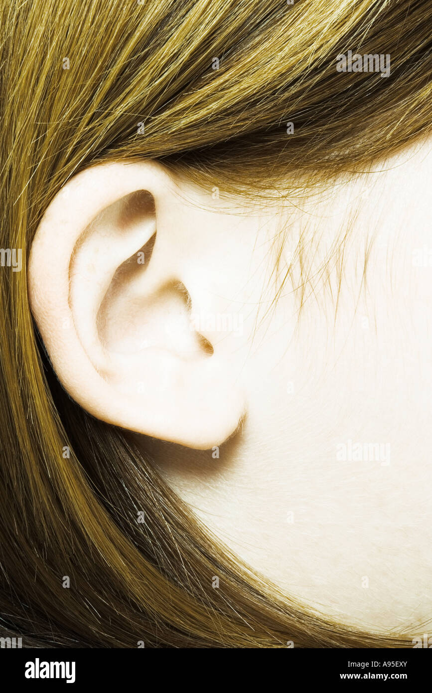 Teenage girl's ear, extreme close-up Stock Photo - Alamy