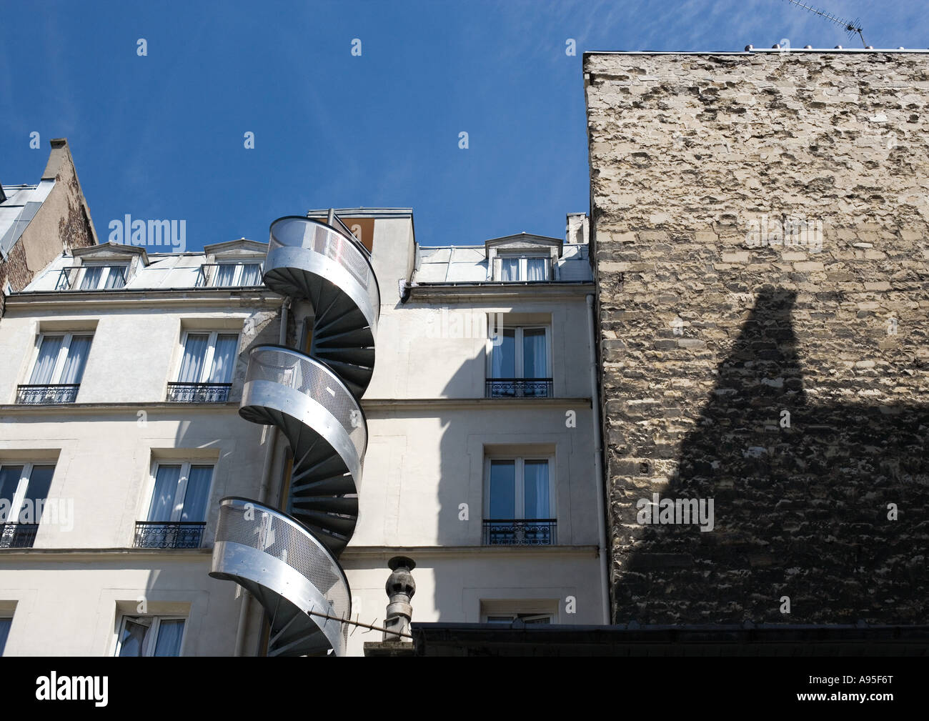 Apartment buildings with spiral staircase on outside Stock Photo - Alamy