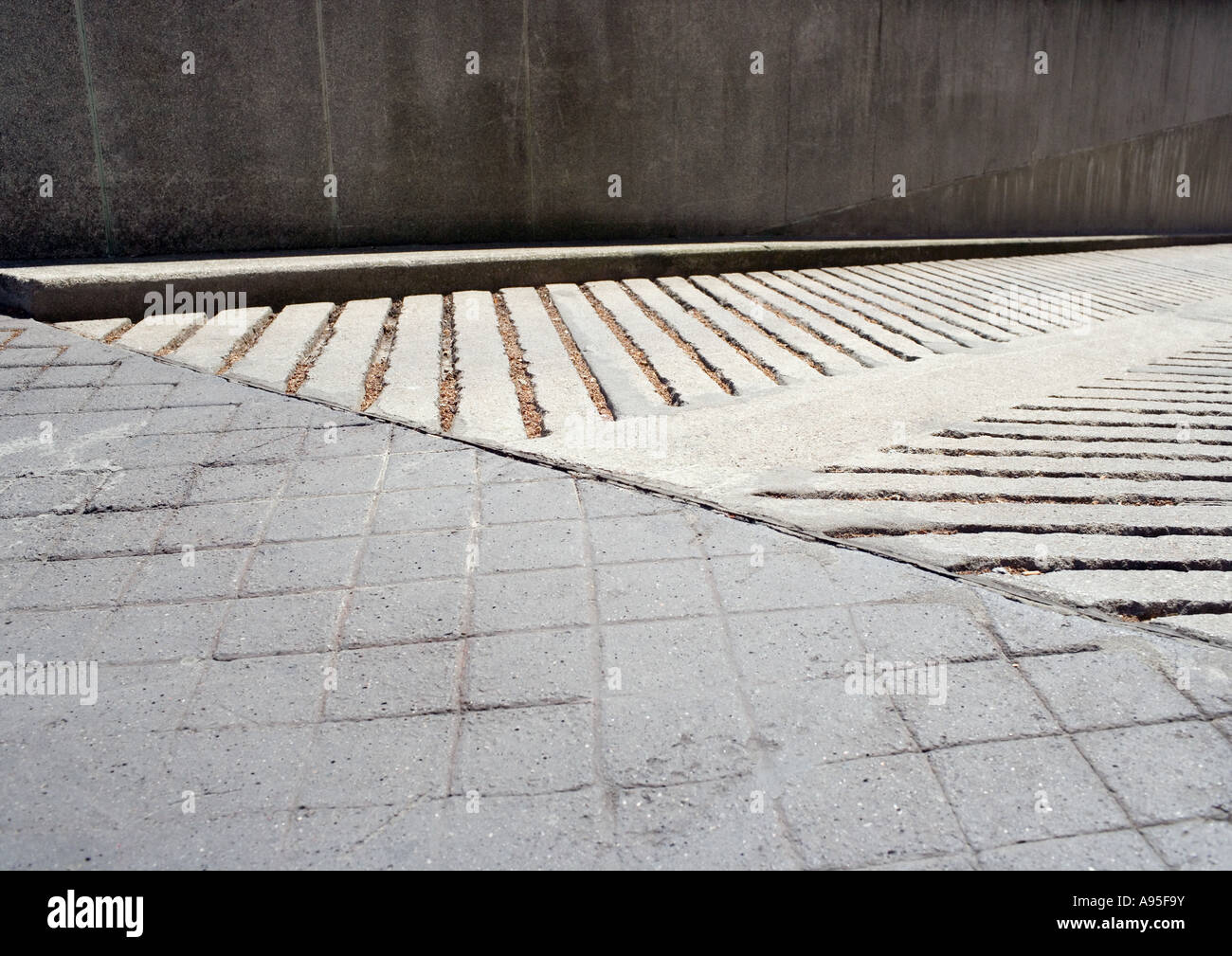 Cement driveway with two different patterns Stock Photo - Alamy