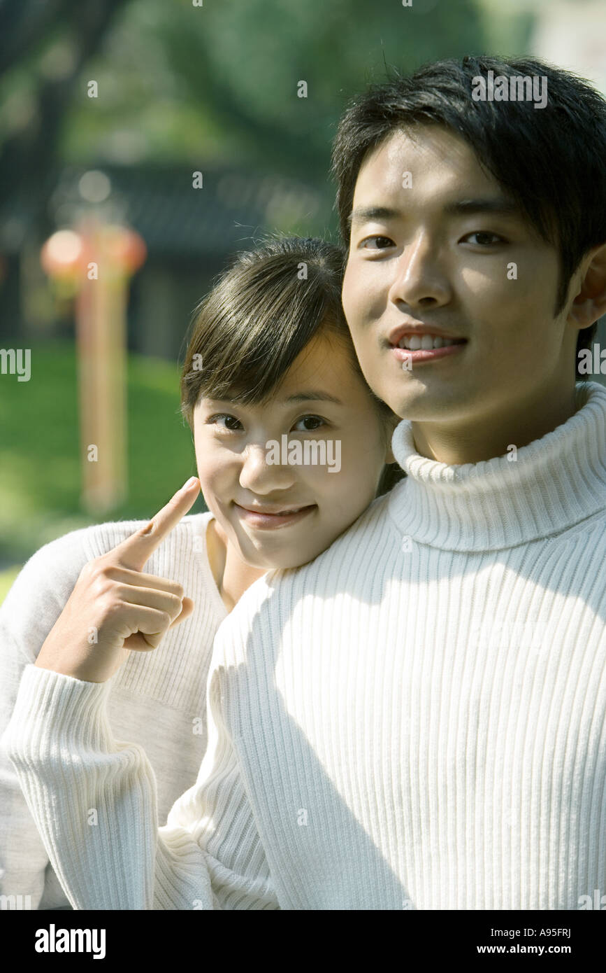 Woman resting head on mans shoulder hi-res stock photography and images ...