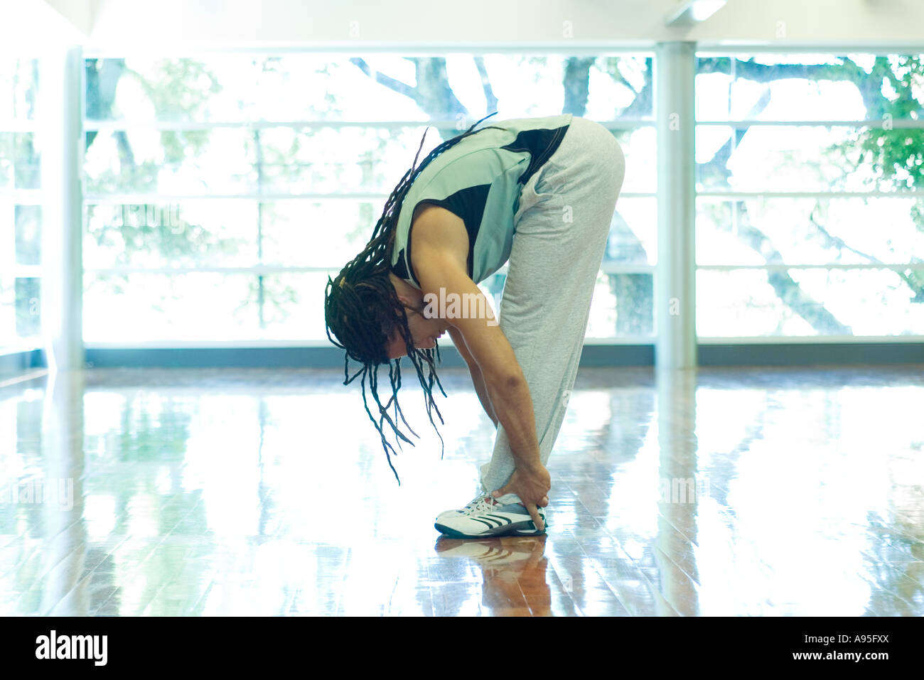 Bend over touch toes hi-res stock photography and images - Alamy