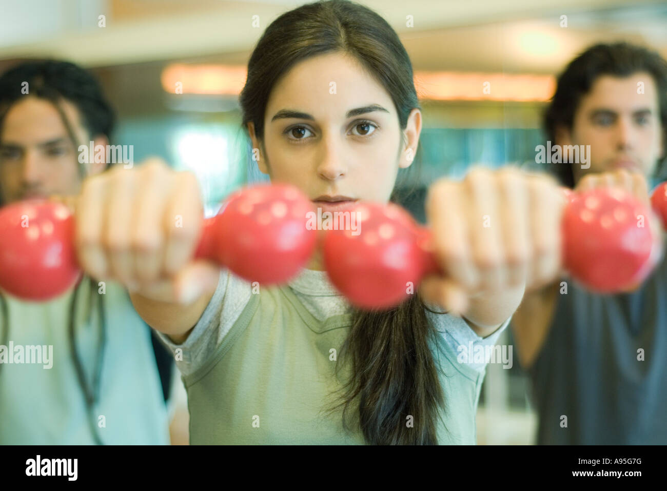 Exercise class working out with dumbbells Stock Photo - Alamy