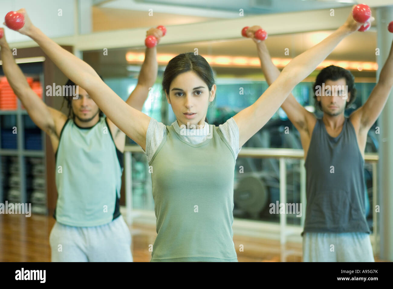 Exercise class working out with dumbbells Stock Photo - Alamy