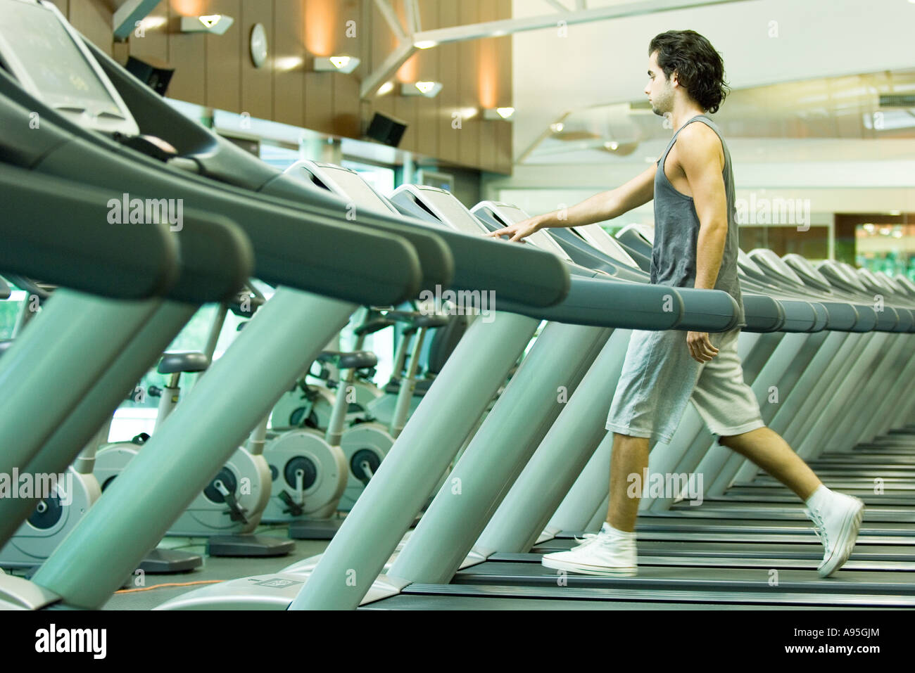 Man running on treadmill Stock Photo - Alamy
