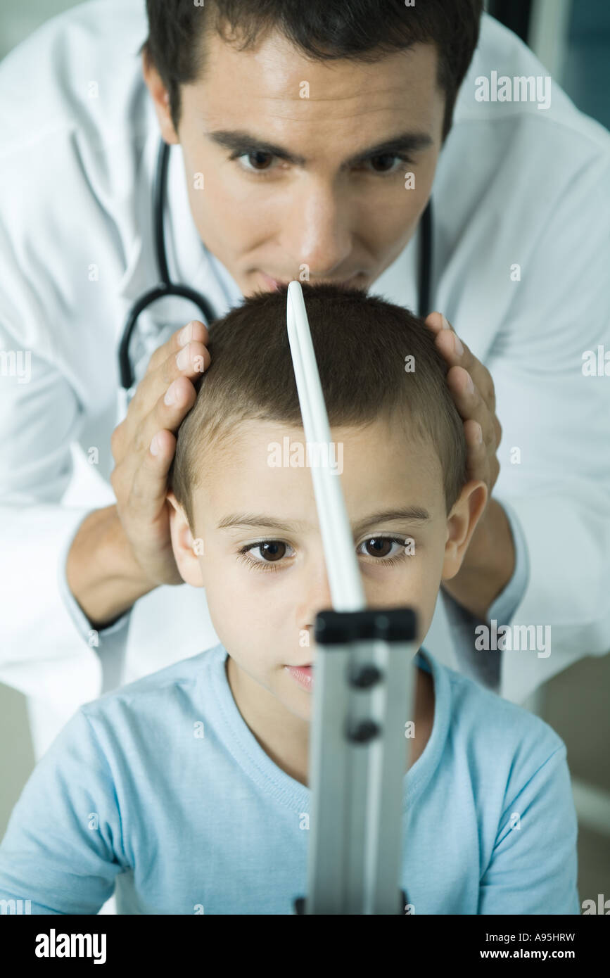 Child height scale doctor hi-res stock photography and images - Alamy