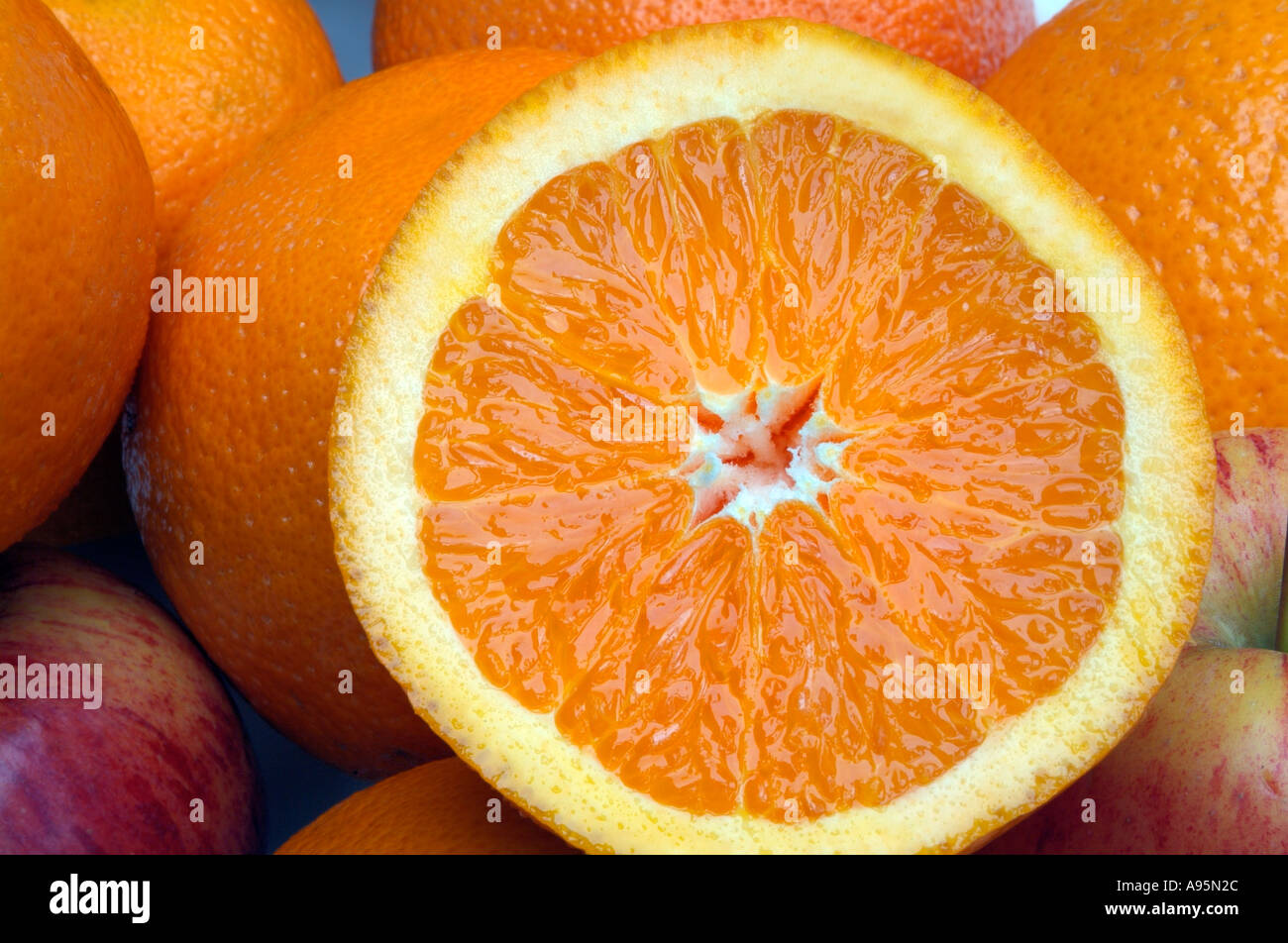 Dish with orange cut open Stock Photo - Alamy