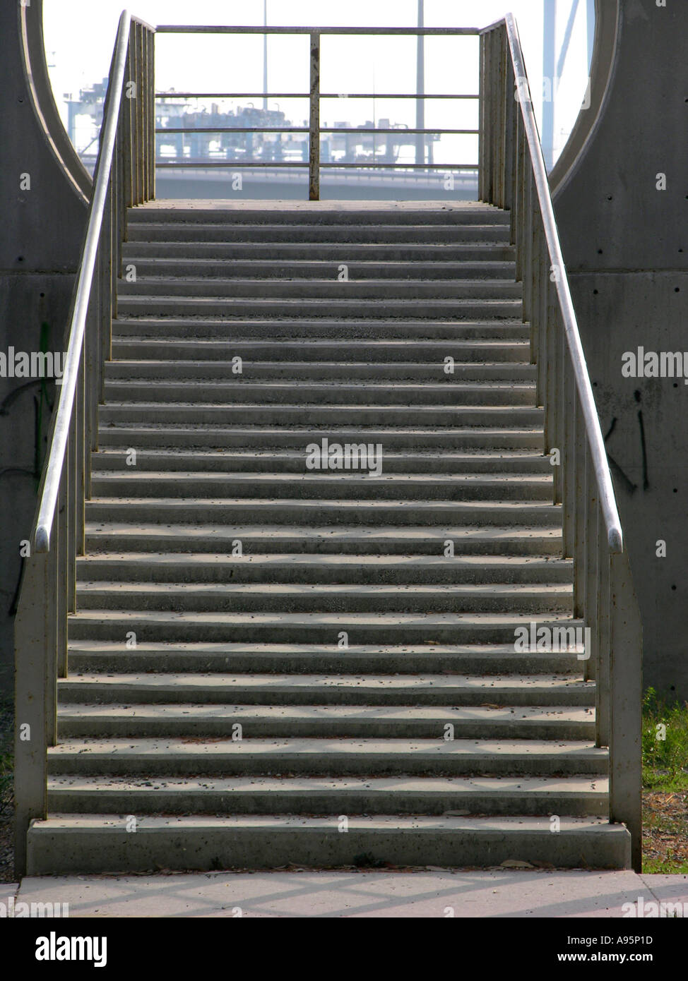 A staircase leading to a circular window Stock Photo - Alamy