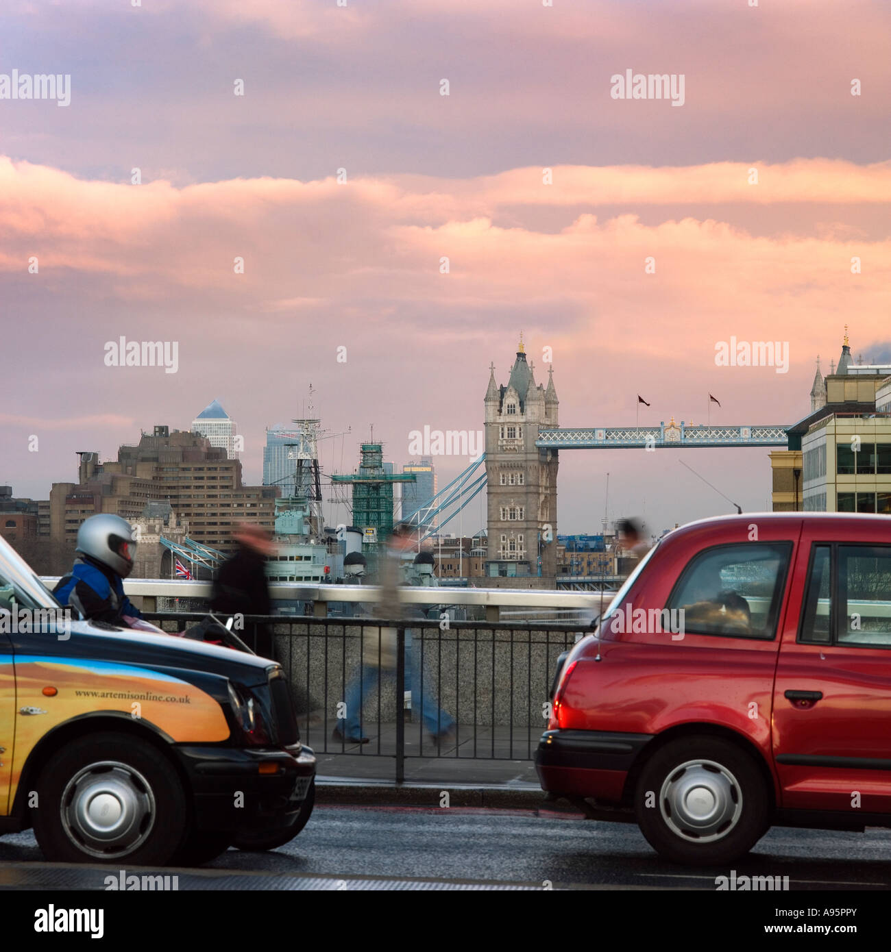 taxis crossing london bridge at daylight with tower bridge Stock Photo ...