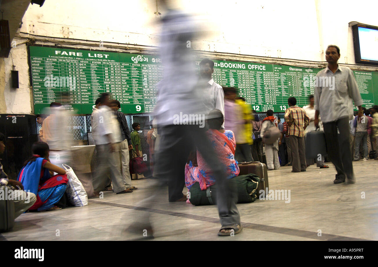 Indian passengers waiting at Railway Station, Ahmedabad, Gujarat, India ...
