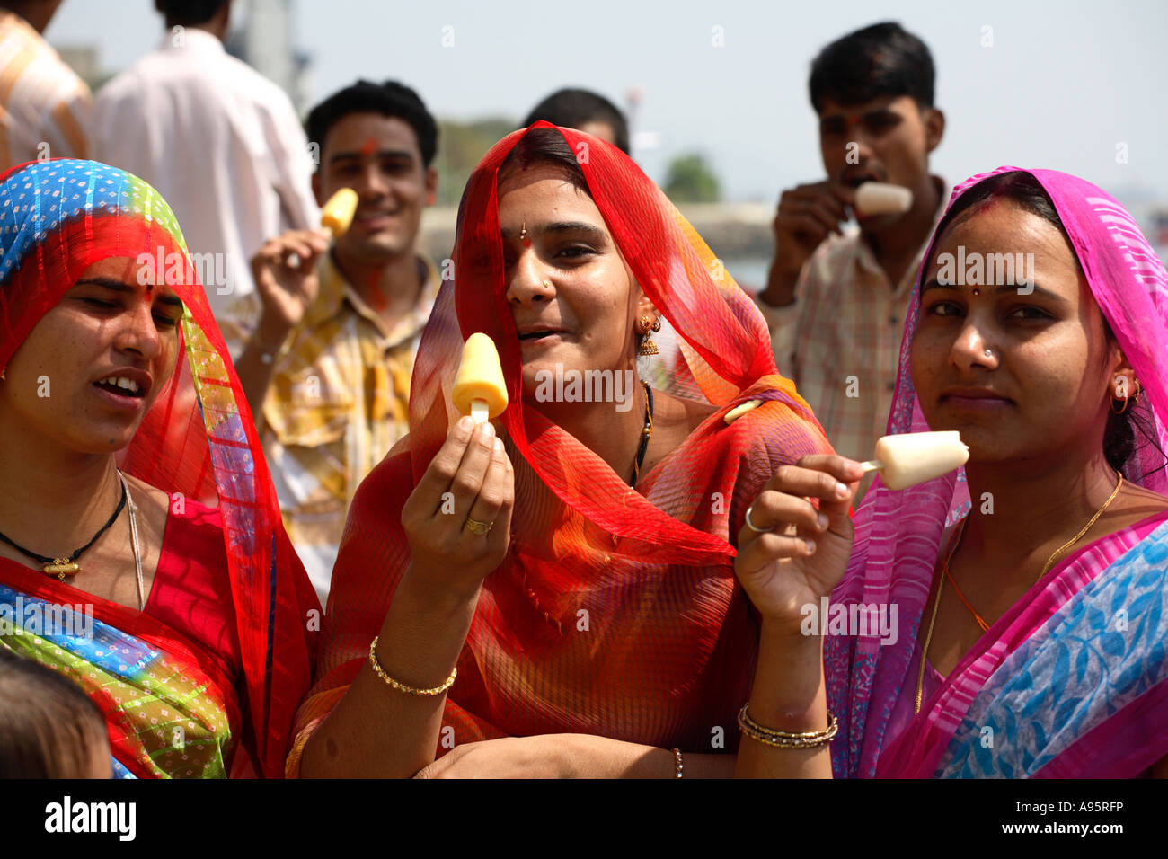 Young Indian females eating ice-creams, Mumbai, India Stock Photo - Alamy