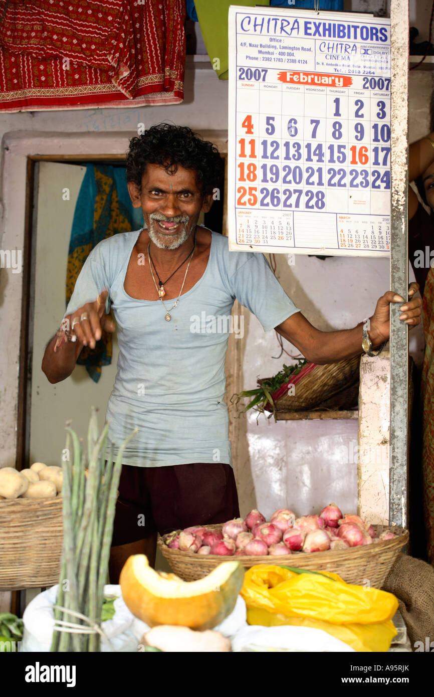 Crazy looking Indian Man posing outside shop, Mumbai, India Stock Photo ...