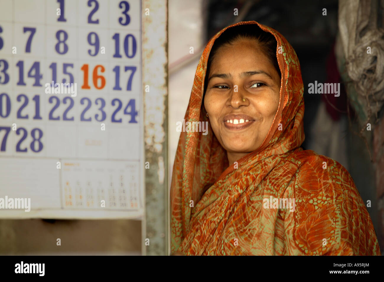 Indian woman posing outside shop, Mumbai, India Stock Photo - Alamy