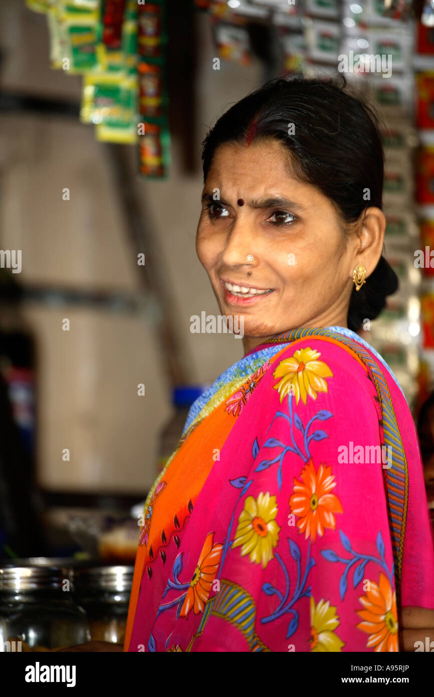 Indian woman posing outside shop, Mumbai, India Stock Photo - Alamy