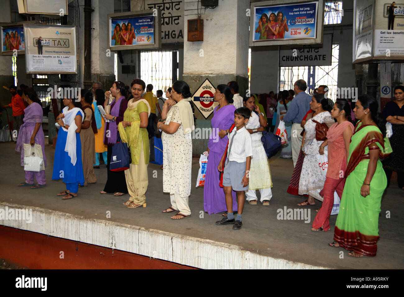 Indian women waiting on platform at Churchgate Train Station, Mumbai ...