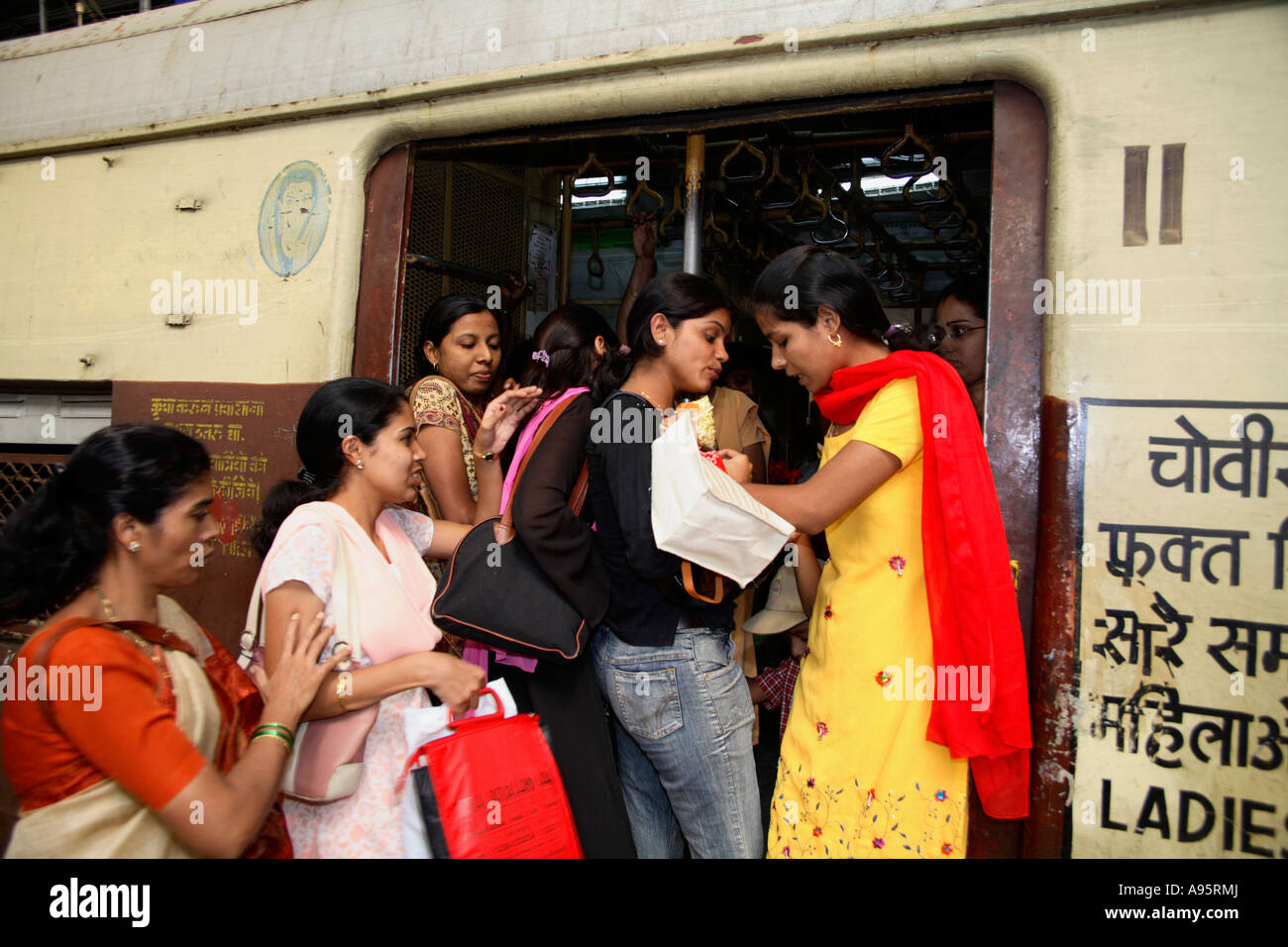 Indian women fighting whilst boarding Ladies Only carriage at ...