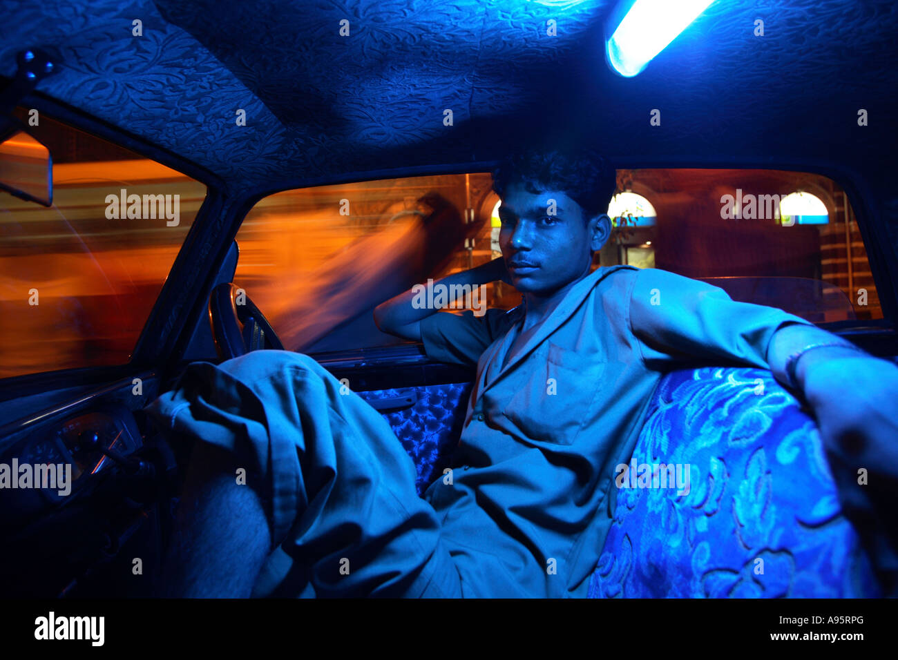 Young taxi driver mumbai hi-res stock photography and images - Alamy