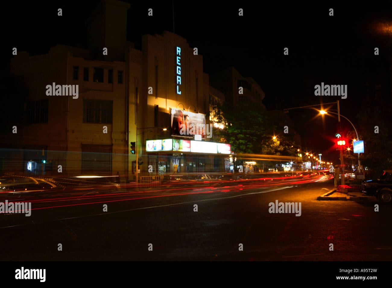 Car light trails outside Regal Cinema (art deco movie theatre), Colaba ...