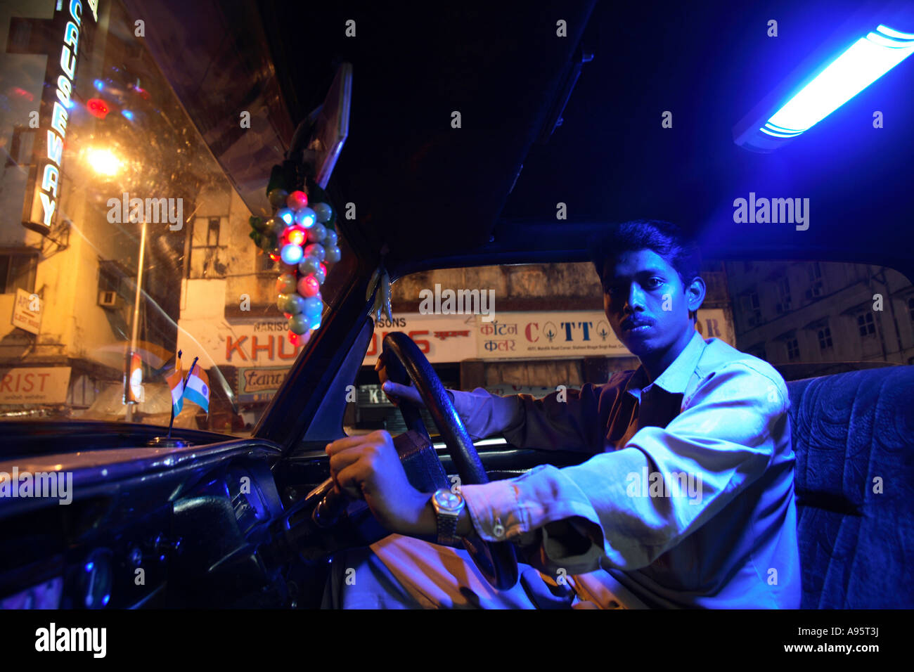 Young taxi driver mumbai hi-res stock photography and images - Alamy