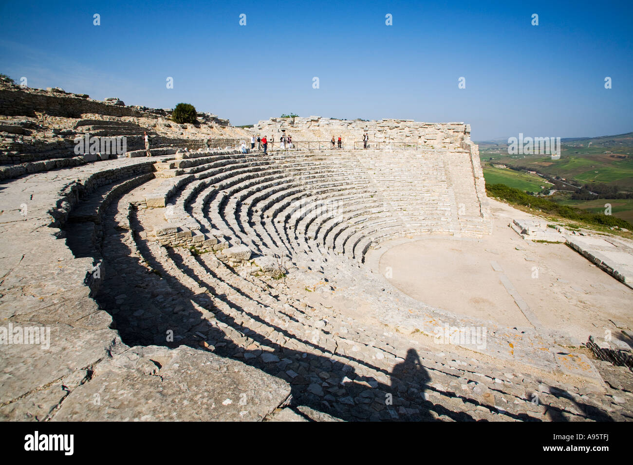 Tourists visit 5th Century BC Greek theater Segesta Sicily Italy Stock ...