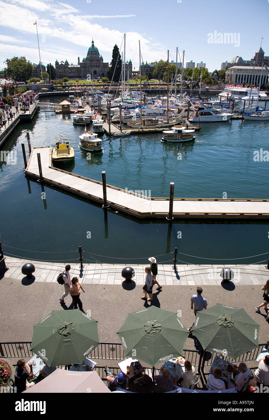 Promenade harbour and parliament buildings Victoria Canada Stock Photo ...