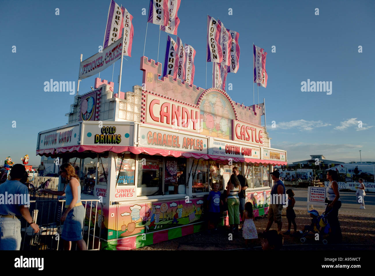 Colorful concession stand against blue sky at fairgrounds Stock Photo ...