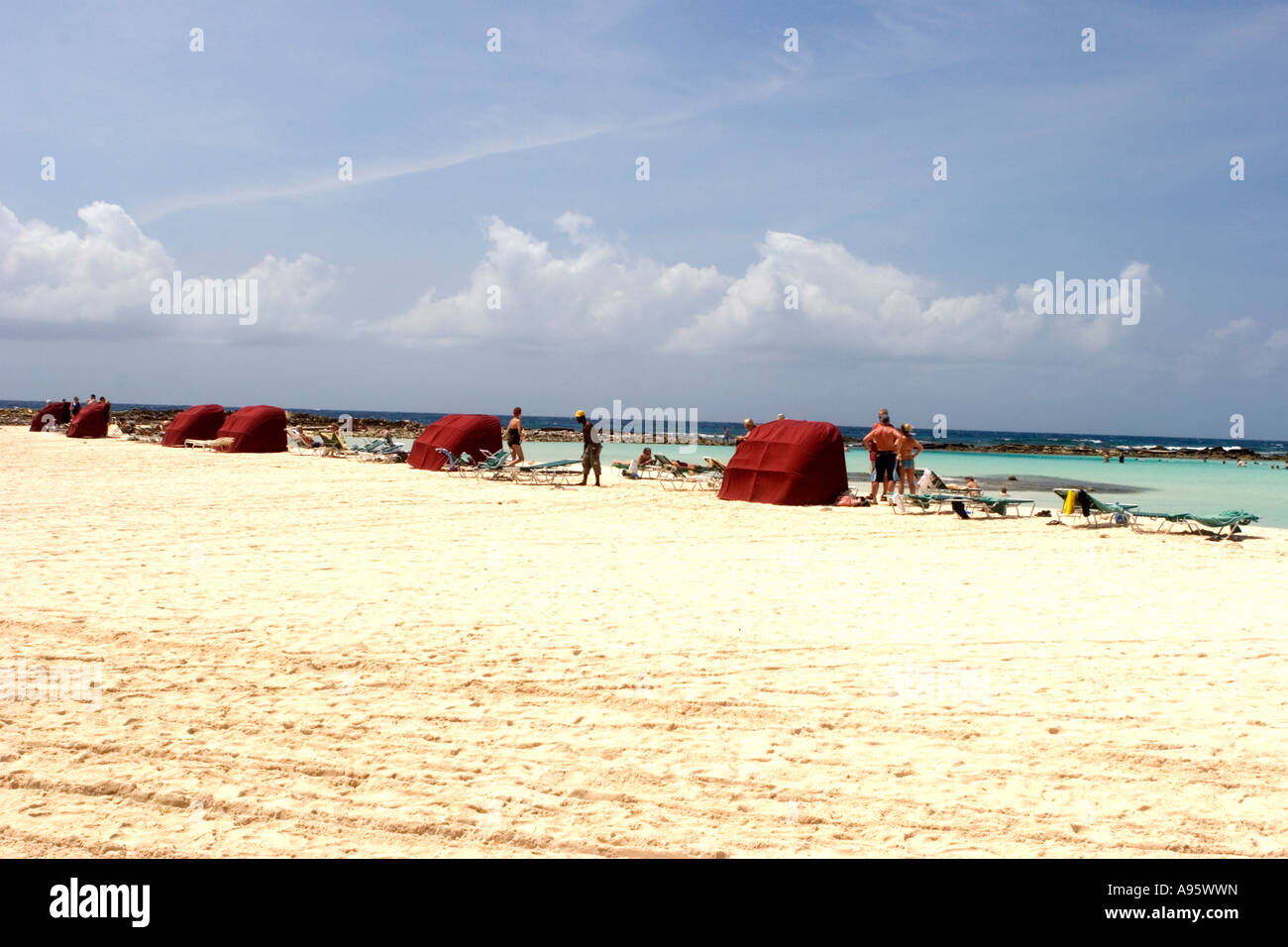 Bustling Tropical Beach in Aruba Stock Photo - Alamy