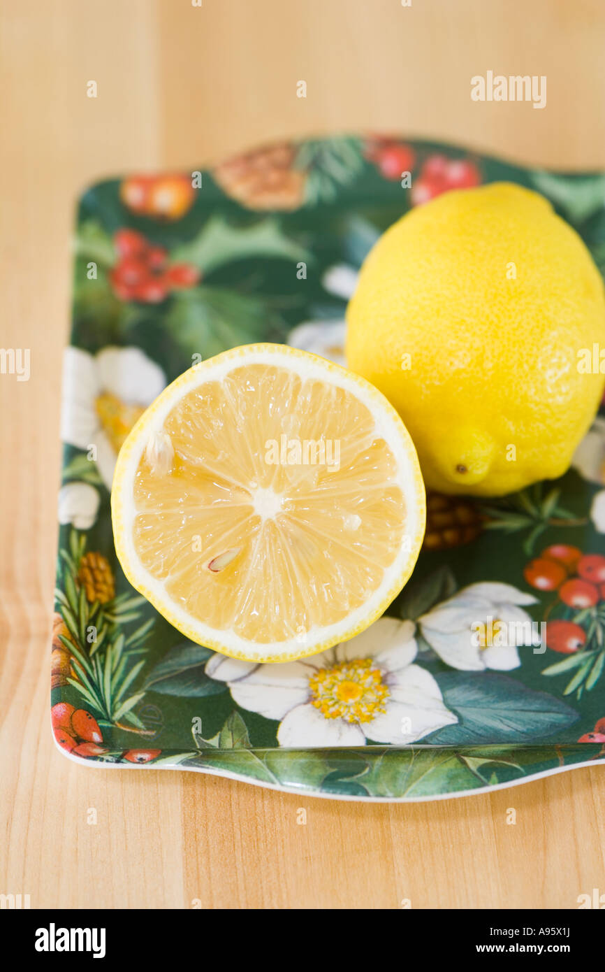 Lemons on plate Stock Photo - Alamy