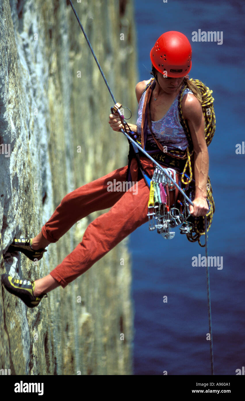 Female rock climber at Point Perpendicular New South Wales Australia ...