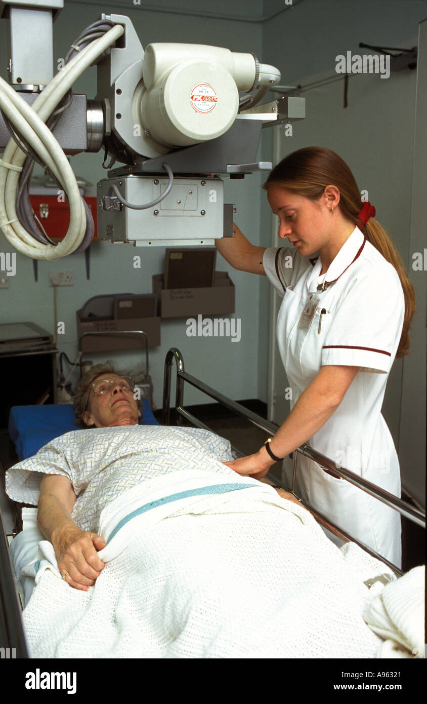 Radiographer taking x-ray of patient Stock Photo - Alamy