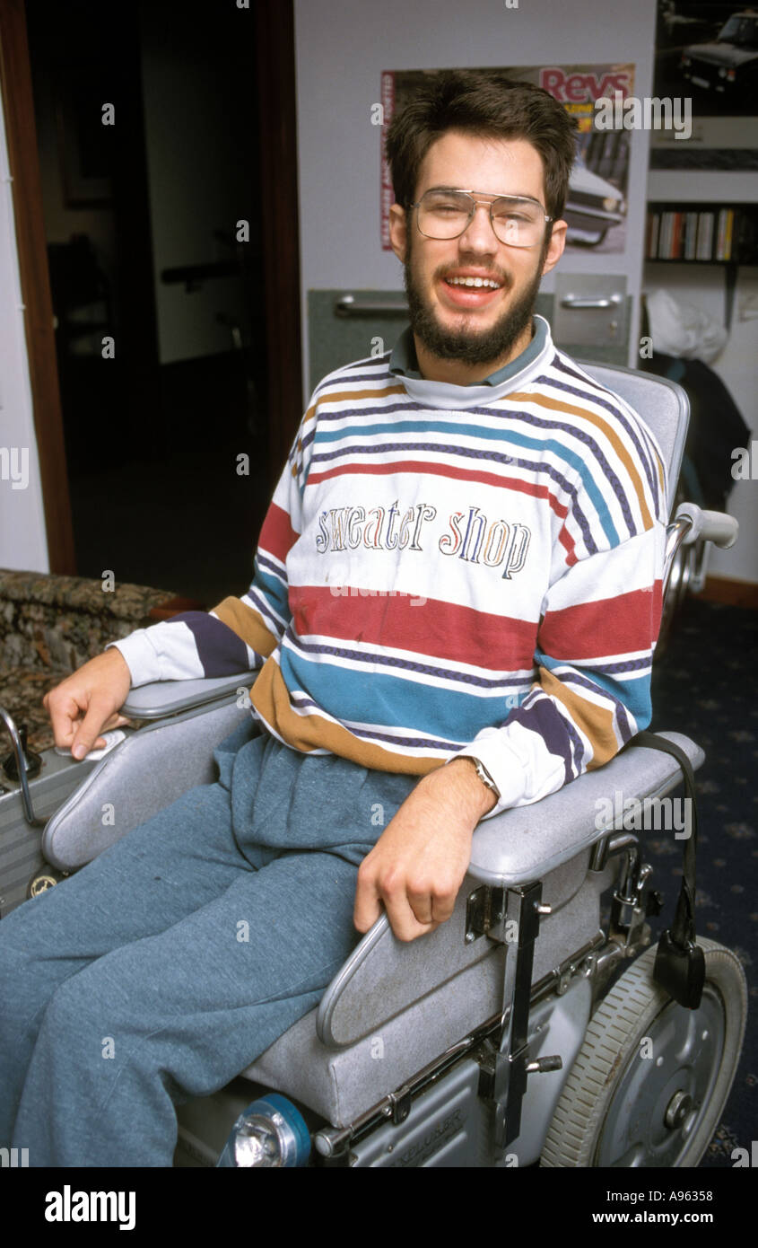 Portrait of a disabled man in motorised wheelchair Stock Photo - Alamy