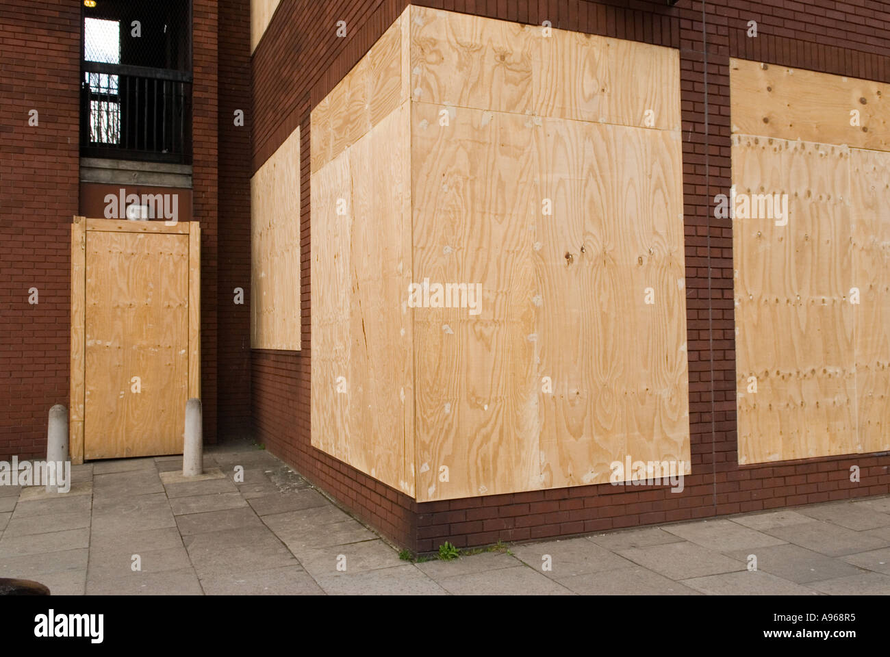 Urban street boarded up building London UK Stock Photo - Alamy