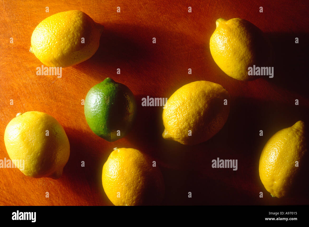 Six Lemons and a Lime Stock Photo - Alamy