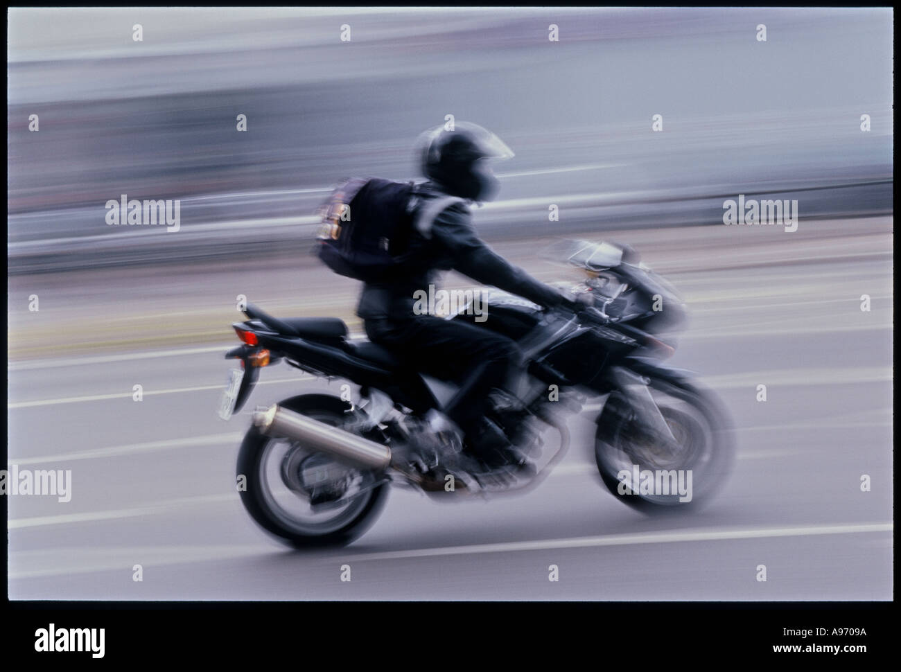 Black motorcycle speeding hi-res stock photography and images - Alamy