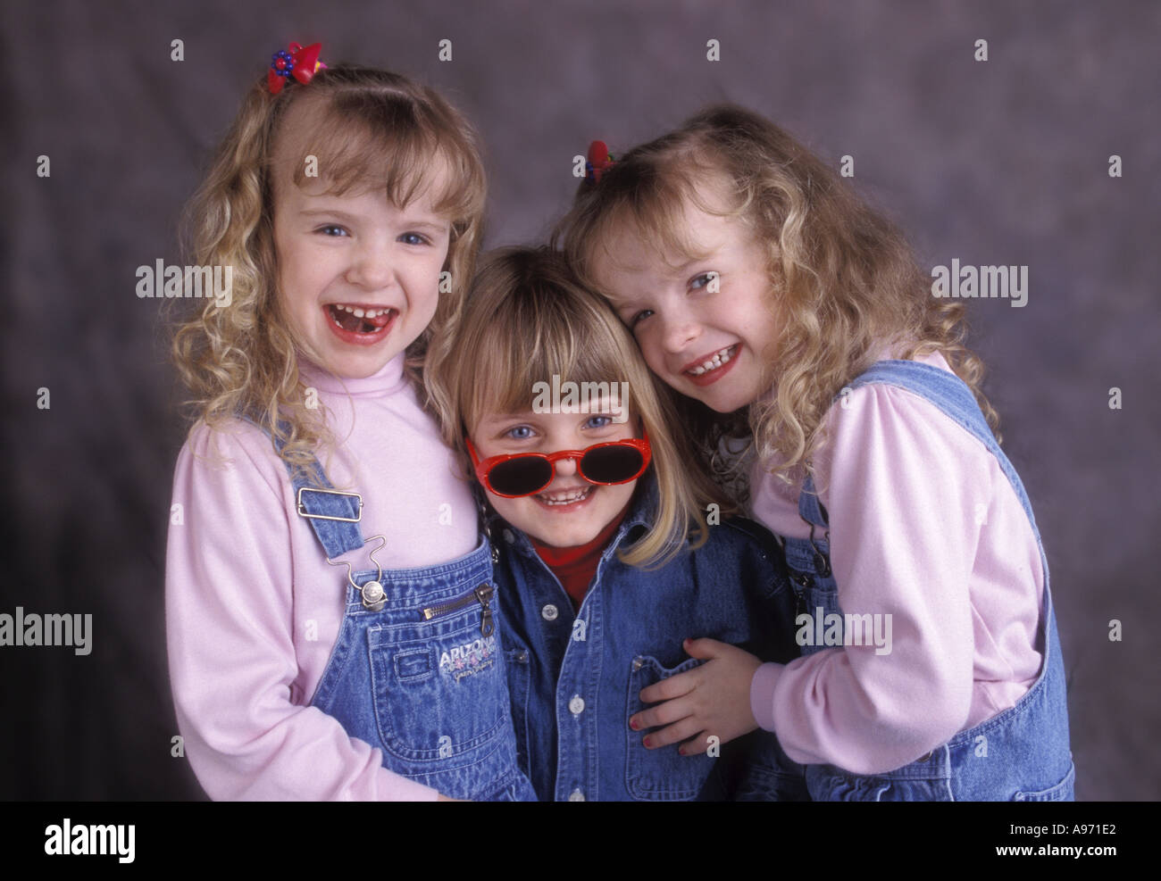 Little girls ham it up for camera Stock Photo - Alamy