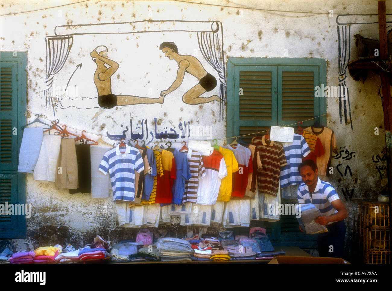 A market trader selling clothes in Cairo Egypt Stock Photo - Alamy